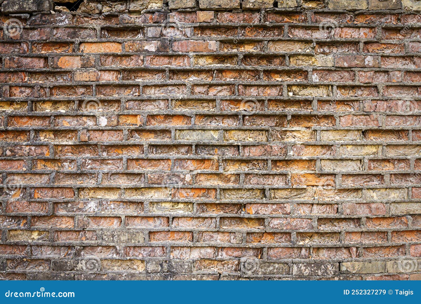 Yellow and red brick wall stock image. Image of exterior - 252327279