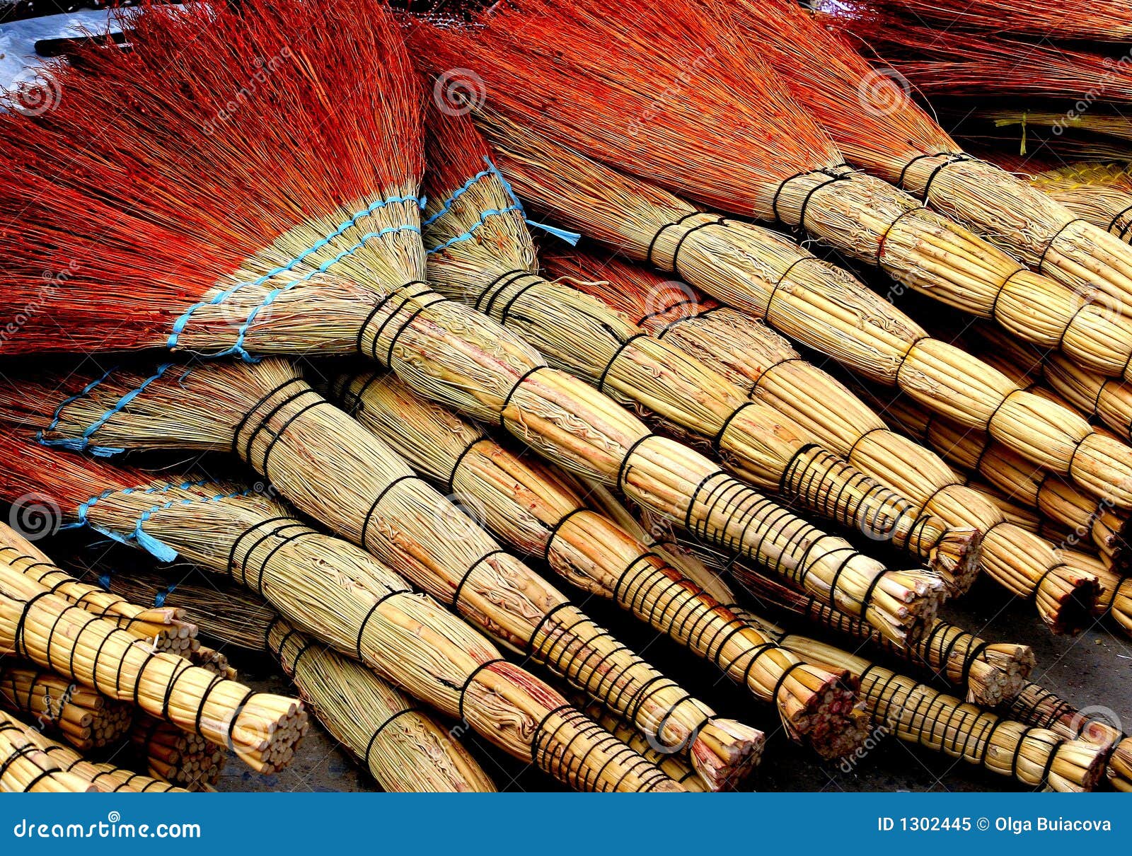 Yellow-red brooms stock image. Image of brooms, detail - 1302445