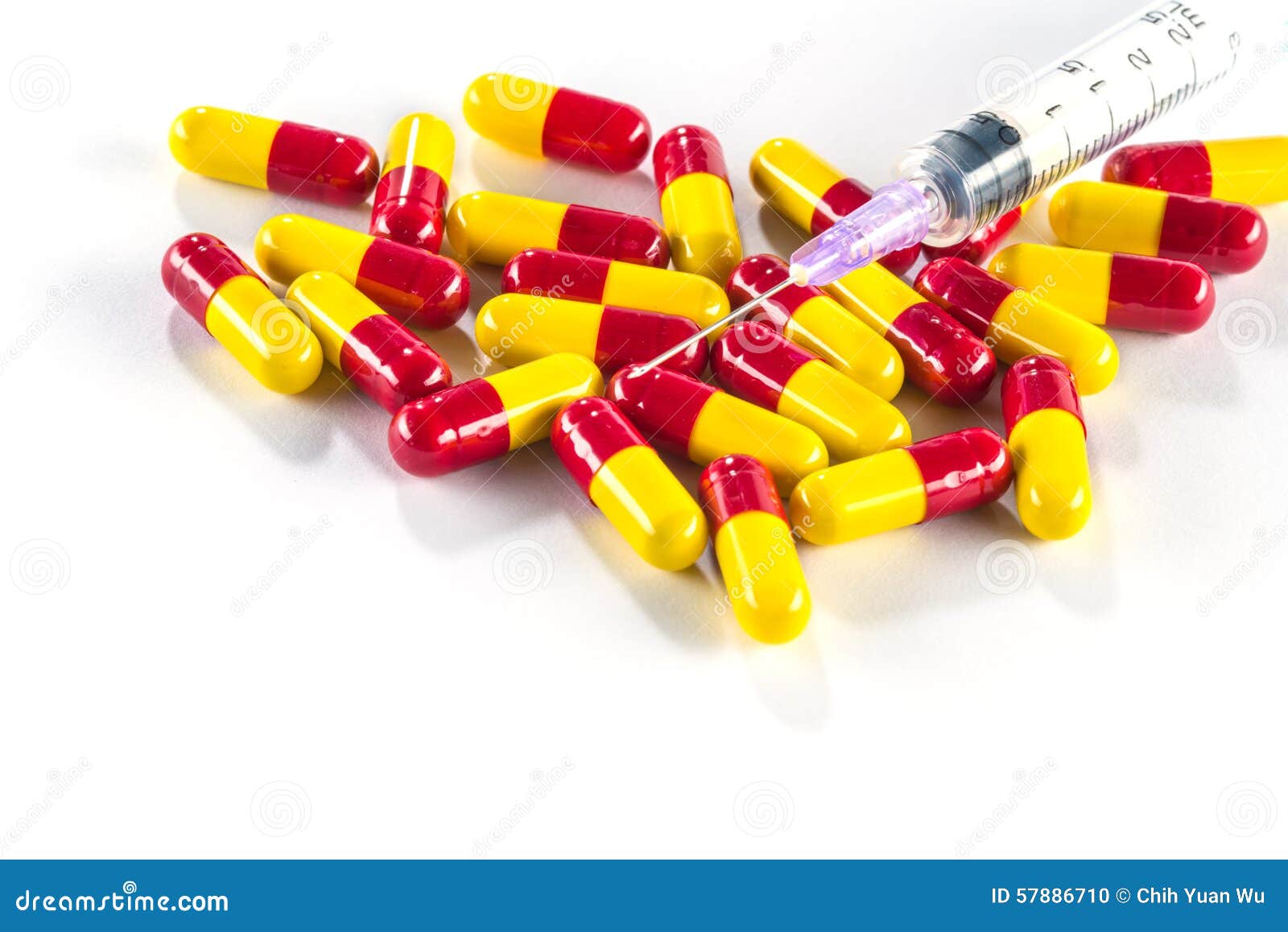 Yellow with Red Capsules and Syringe, Medication Cure Stock Photo ...