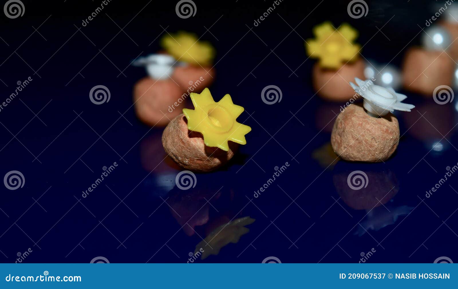 Yellow and Red Multiple Objects on Blue Surface Stock Image - Image of ...