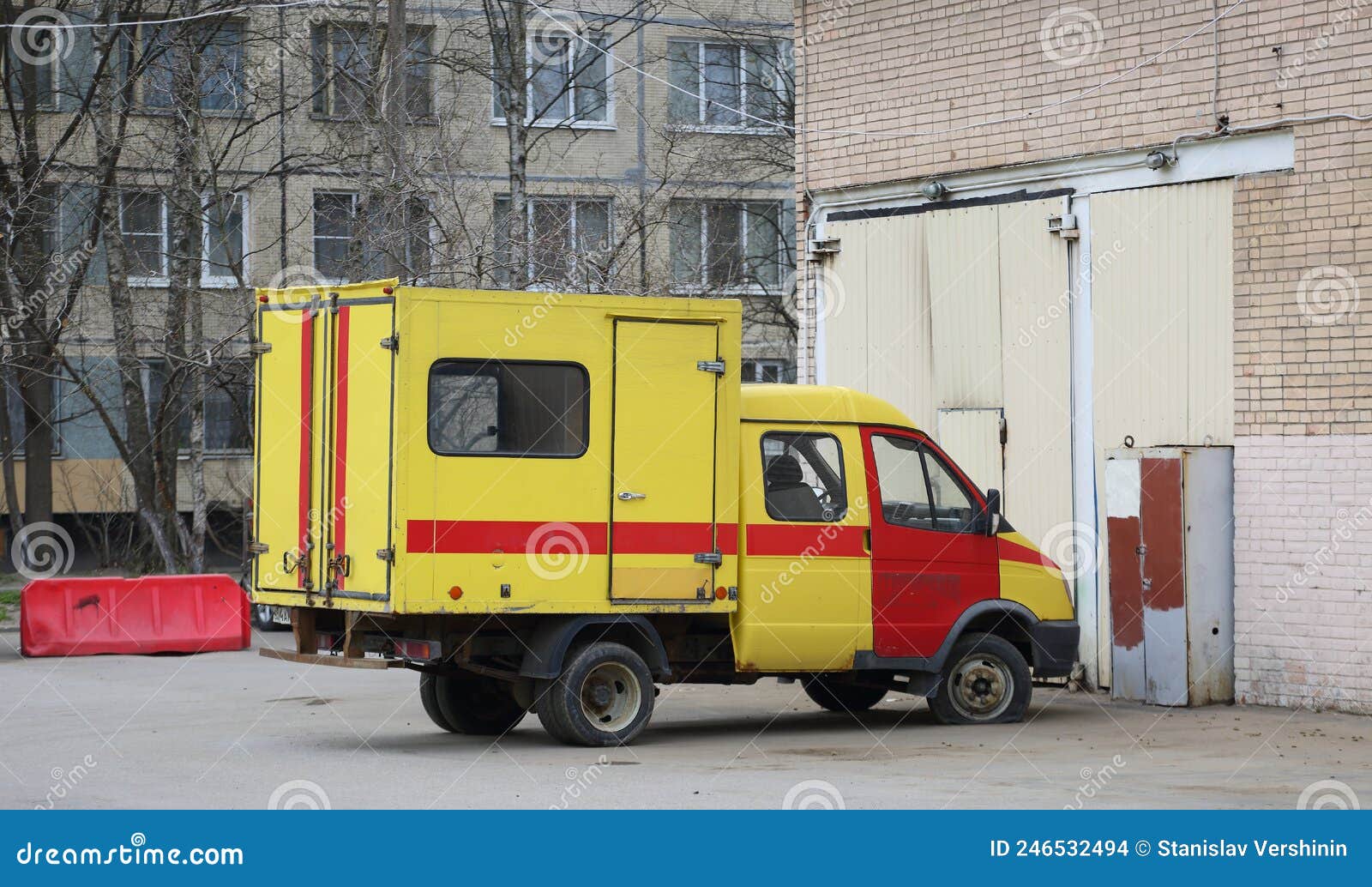 Yellow-red Special Emergency Vehicle with Flat Front Wheel Stock Photo ...