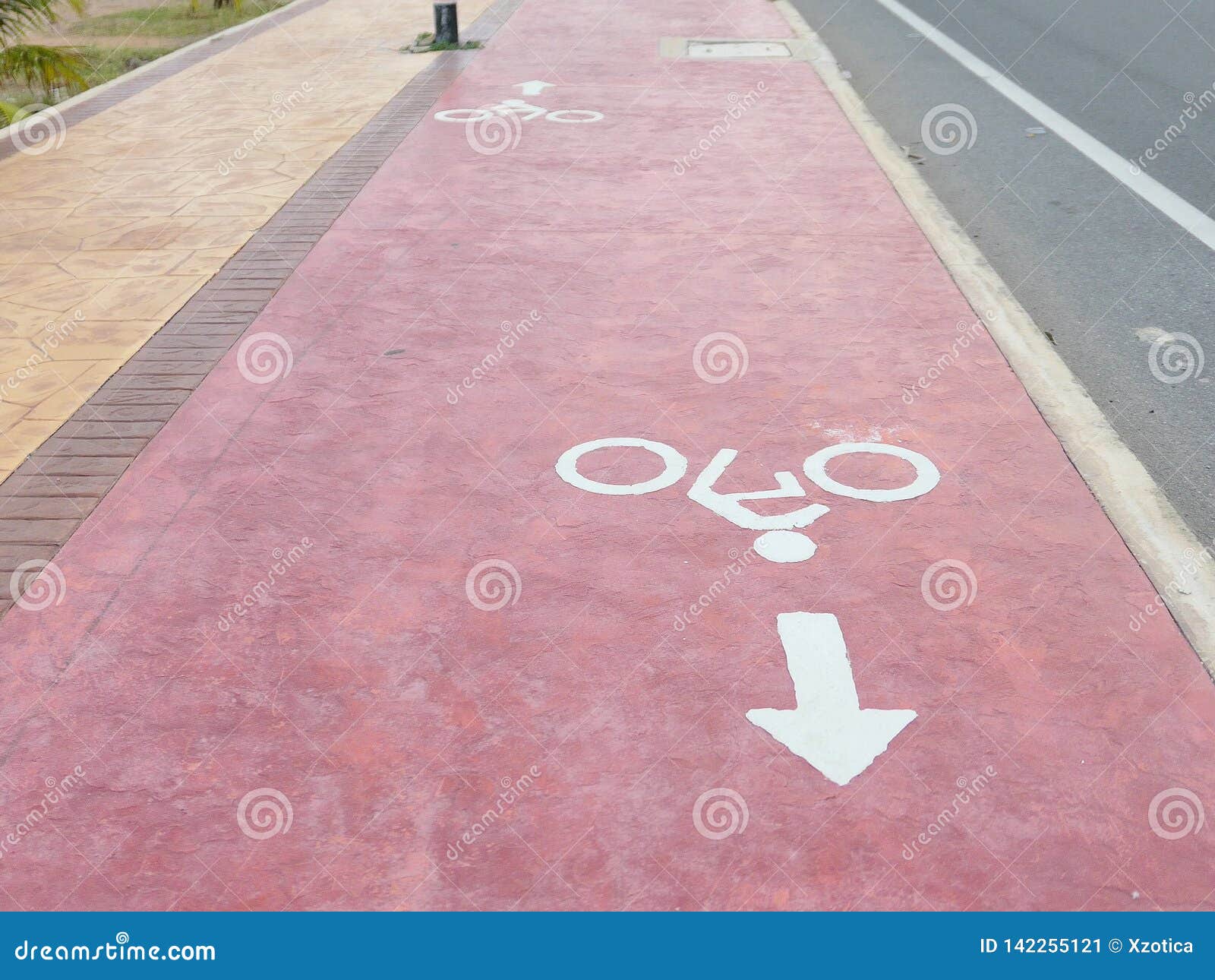 Yellow And Red Stone Surface Pavement Background With Bicycle Lane ...