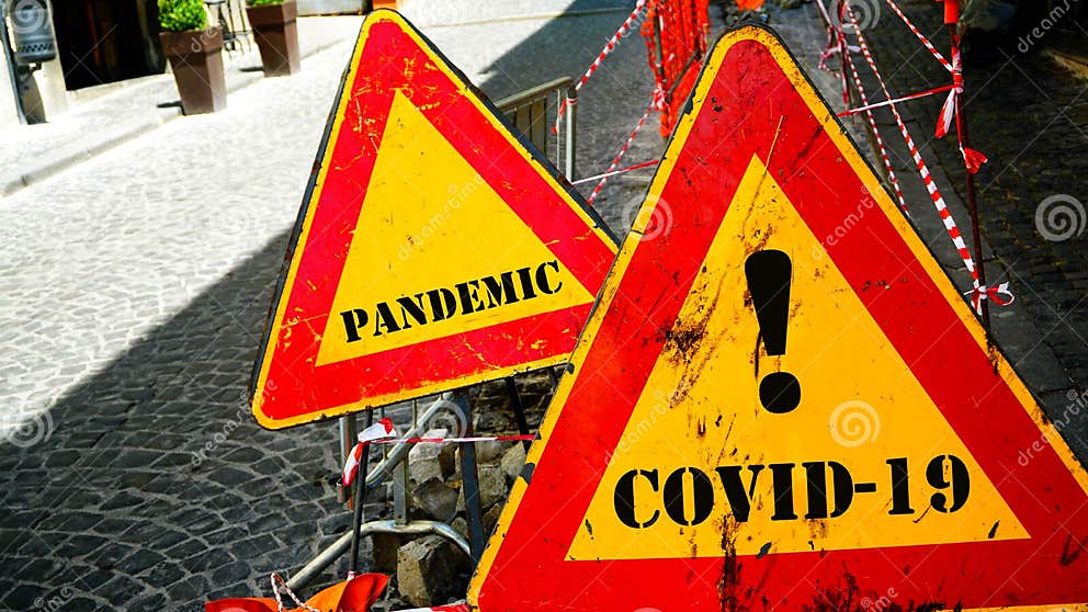 Yellow and Red Triangular Signs of Work in Progress in a City Street ...