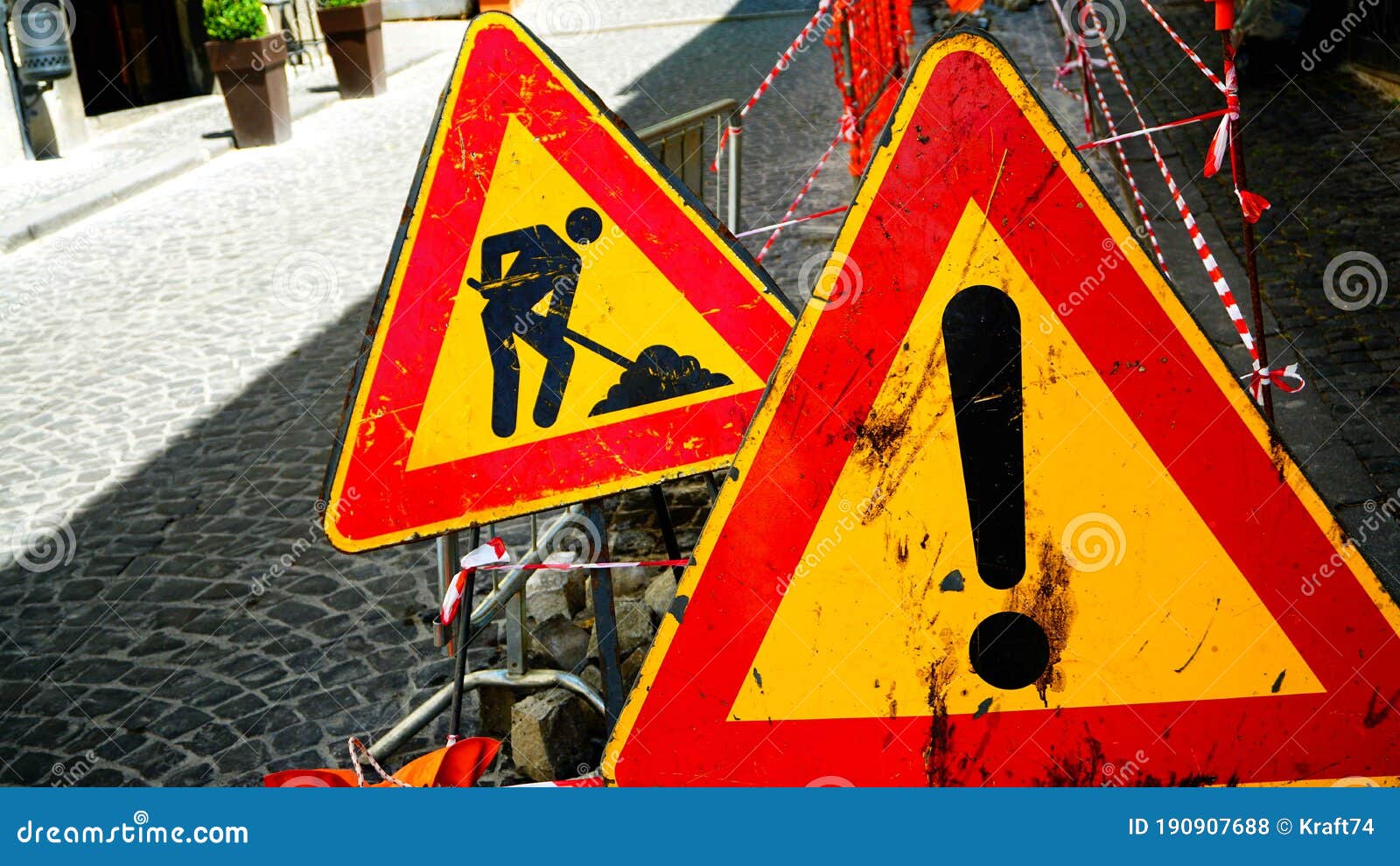 Yellow and Red Triangular Signs of Work in Progress in a City Street ...