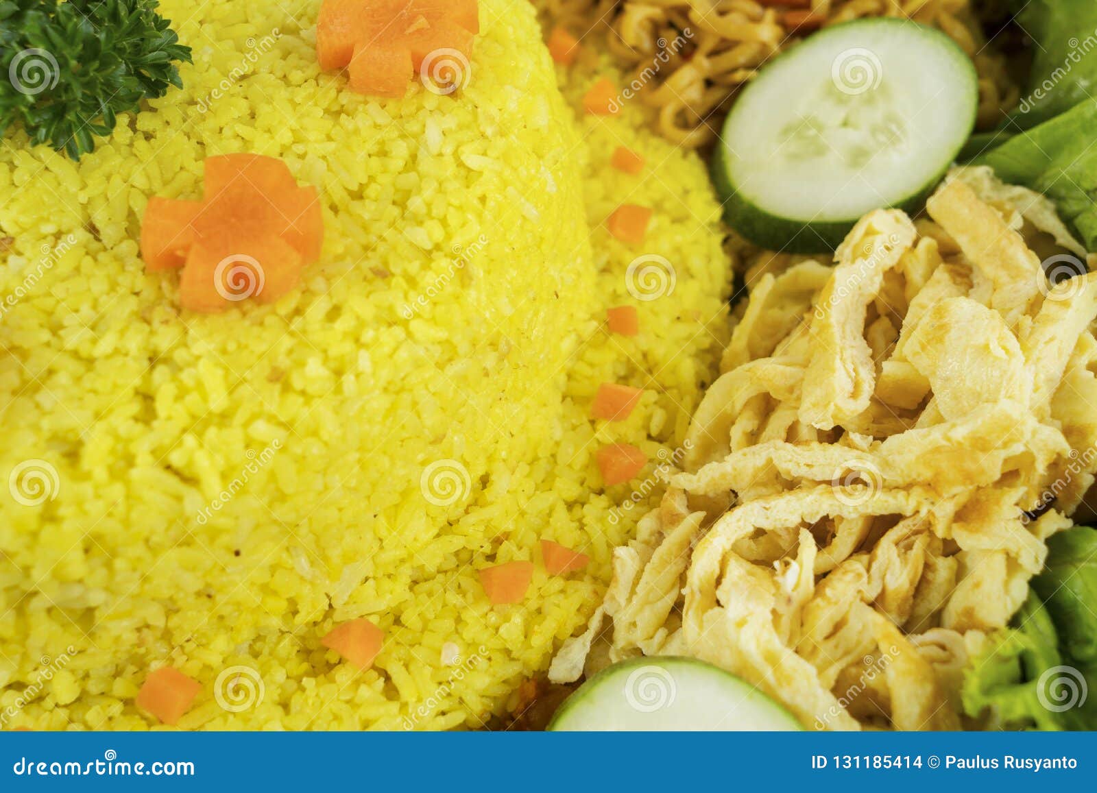 Yellow Rice with Cucumber and Scrambled Egg Stock Photo - Image of ...
