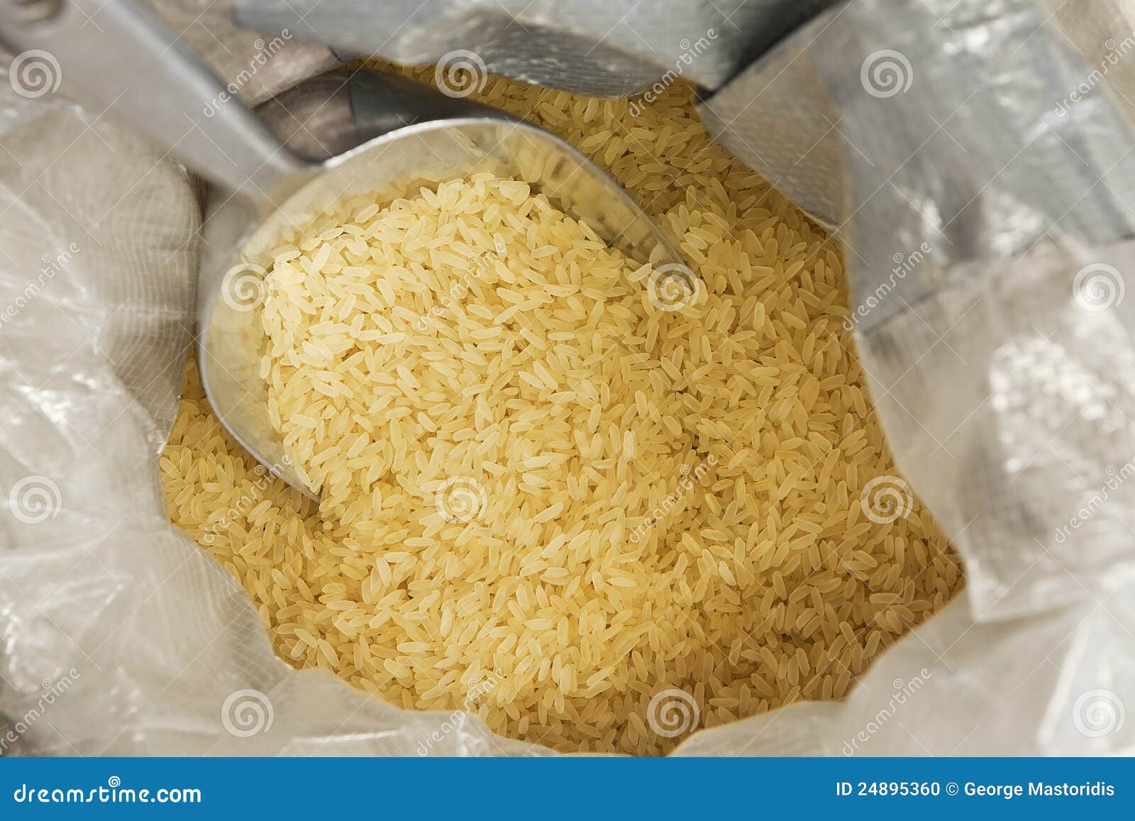 Yellow rice in a sack stock photo. Image of cooked, nutrition - 24895360