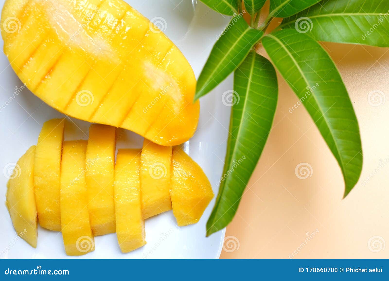 Yellow Ripe Mangoes, Cut into Pieces in a White Dish. Stock Photo ...
