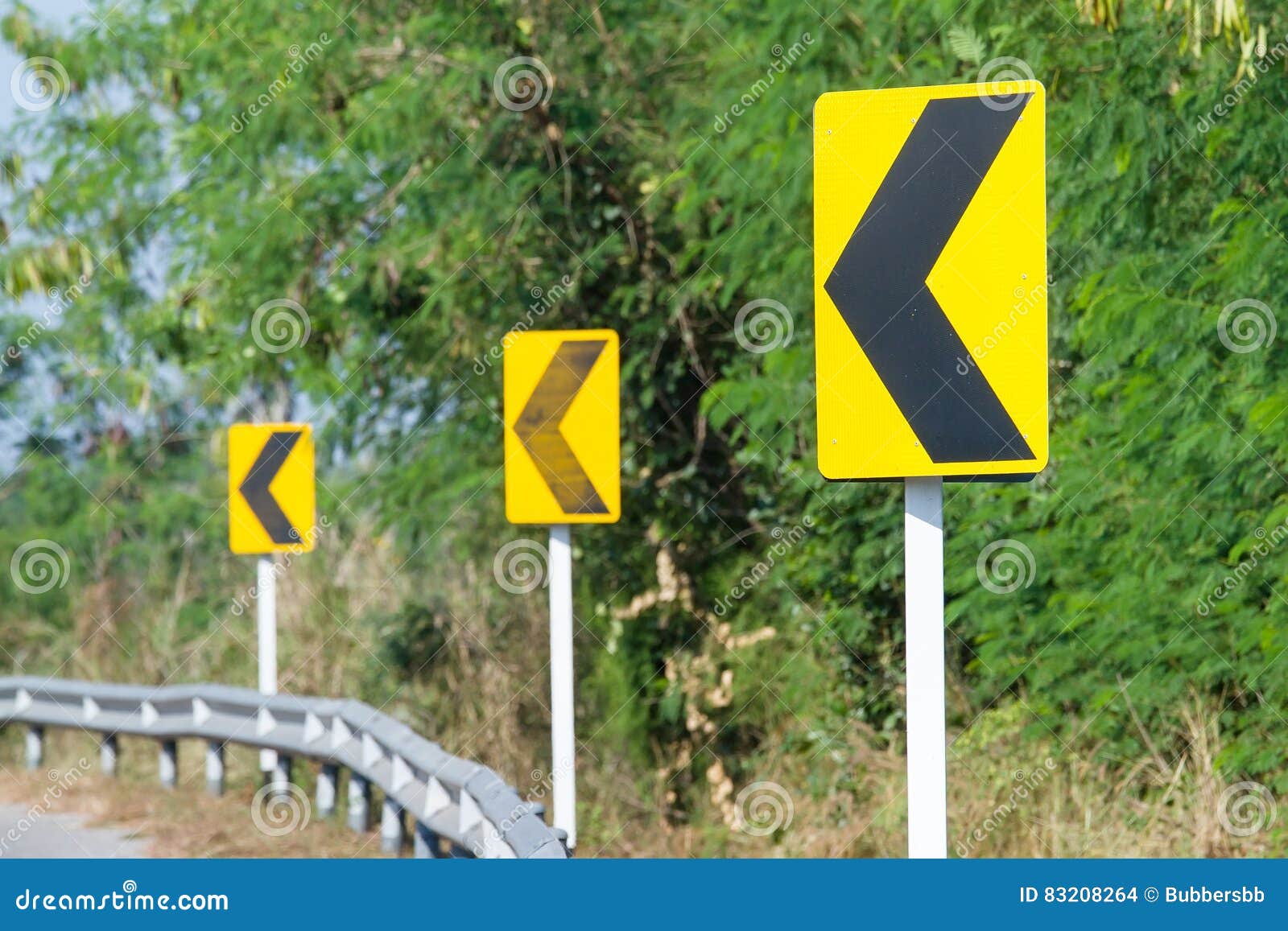 Yellow Road Signs Warn Drivers for Ahead Dangerous Curve Stock Photo ...
