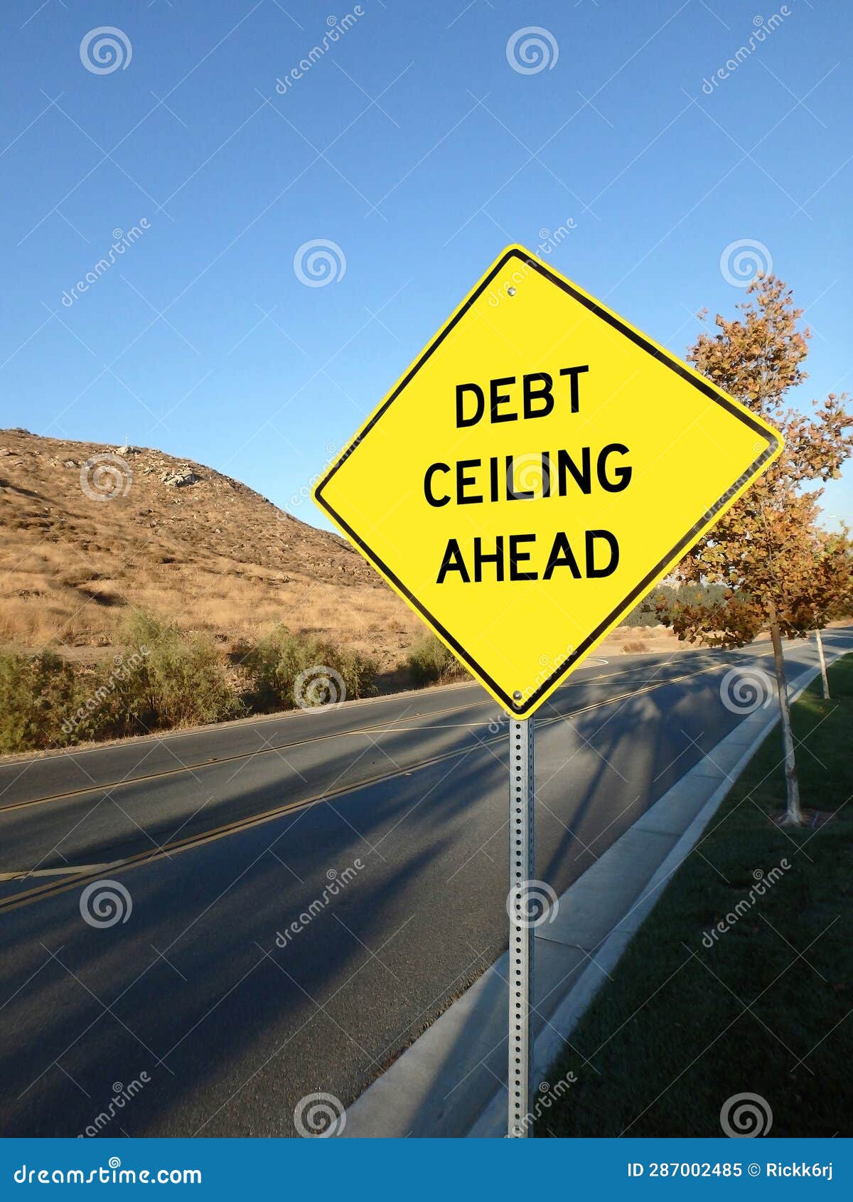 Yellow Roadside Warning Sign Reading Debt Ceiling Ahead. Stock Image ...