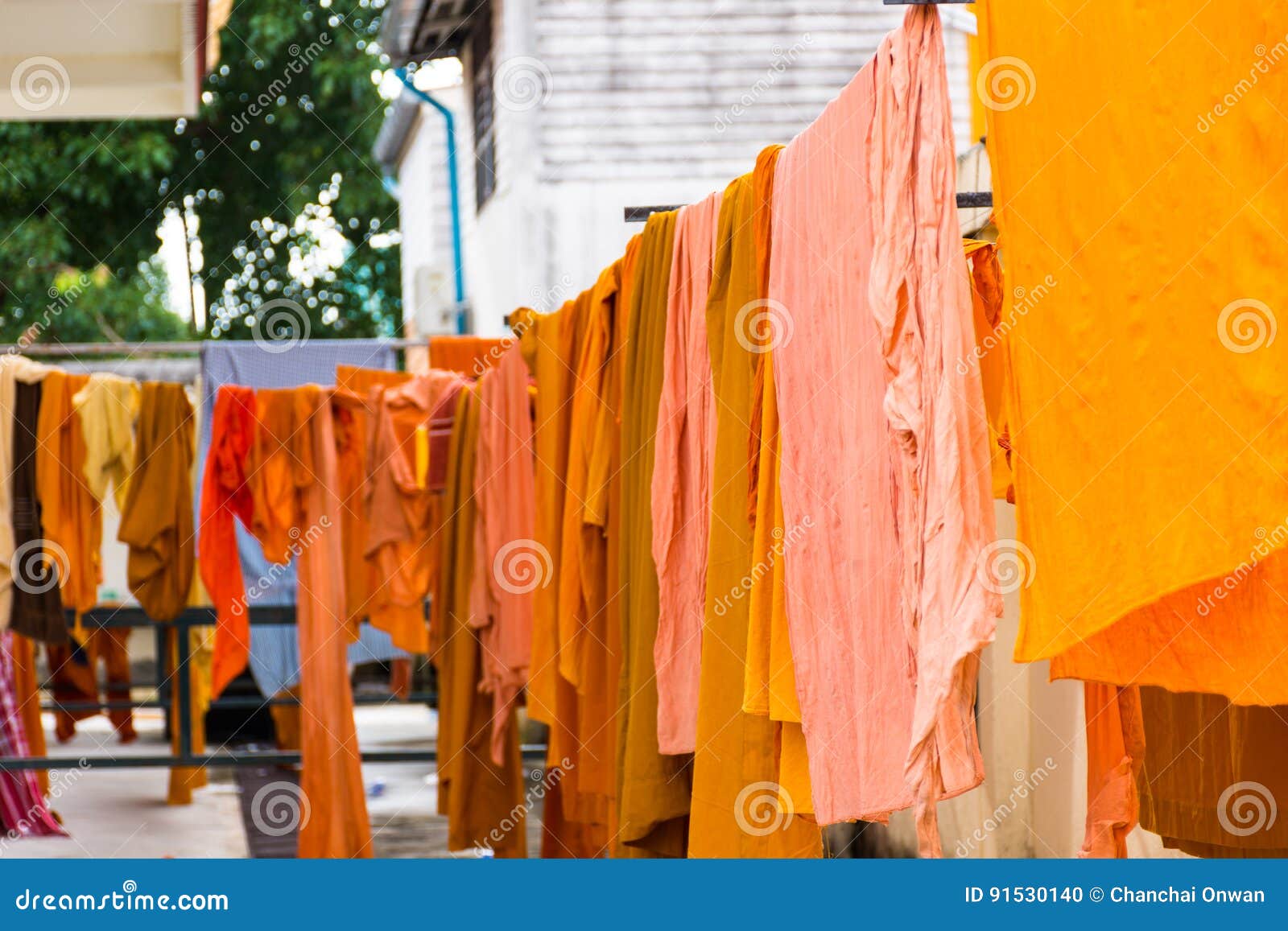 Yellow Robe of Buddhist Monk on the Clothes Line Stock Photo - Image of ...