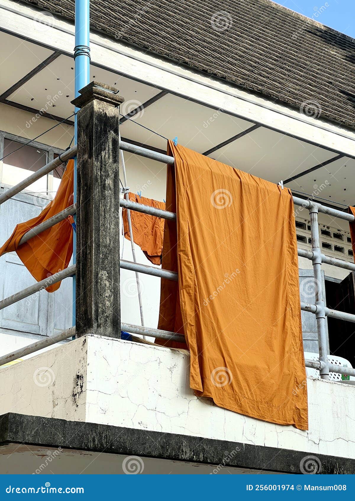 Yellow robe hanging stock photo. Image of temple, textile - 256001974