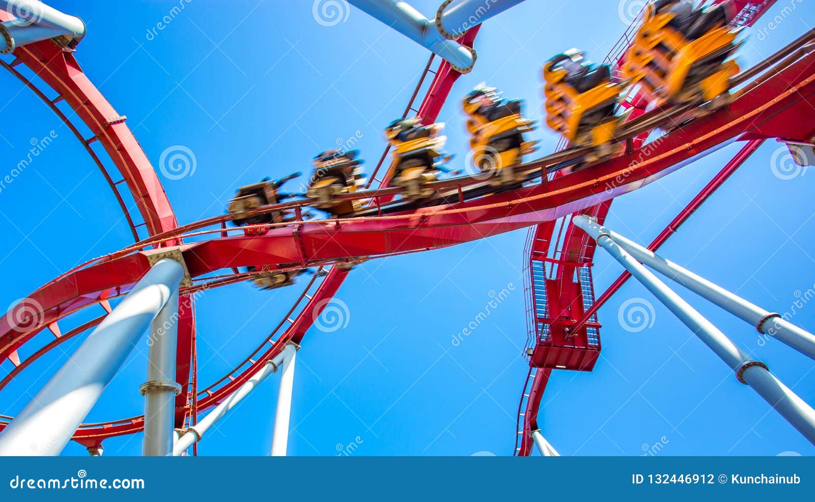 Yellow Roller Coaster with People Inside Move Fast, High Speed Stock ...