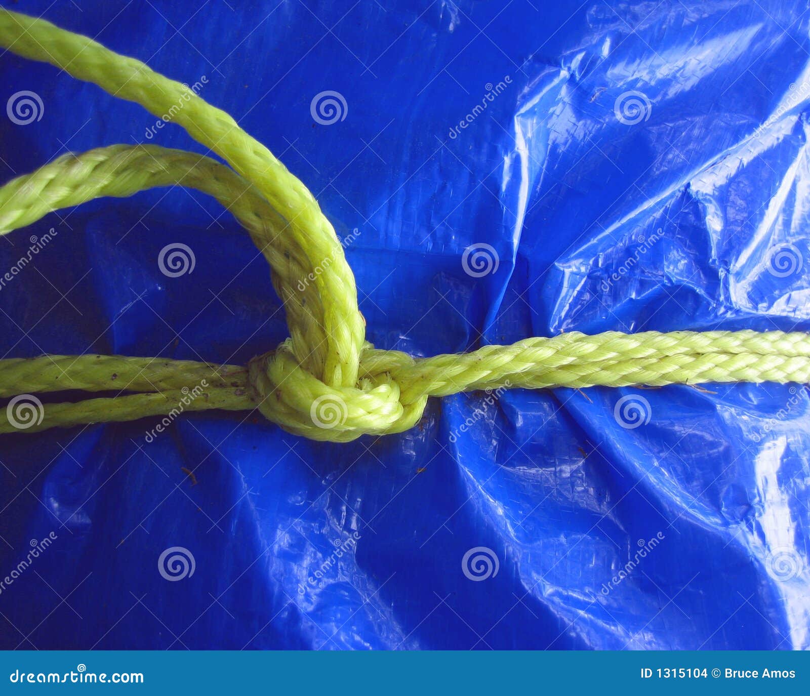Yellow Rope on Blue Tarpaulin Stock Photo - Image of closeup, knot: 1315104