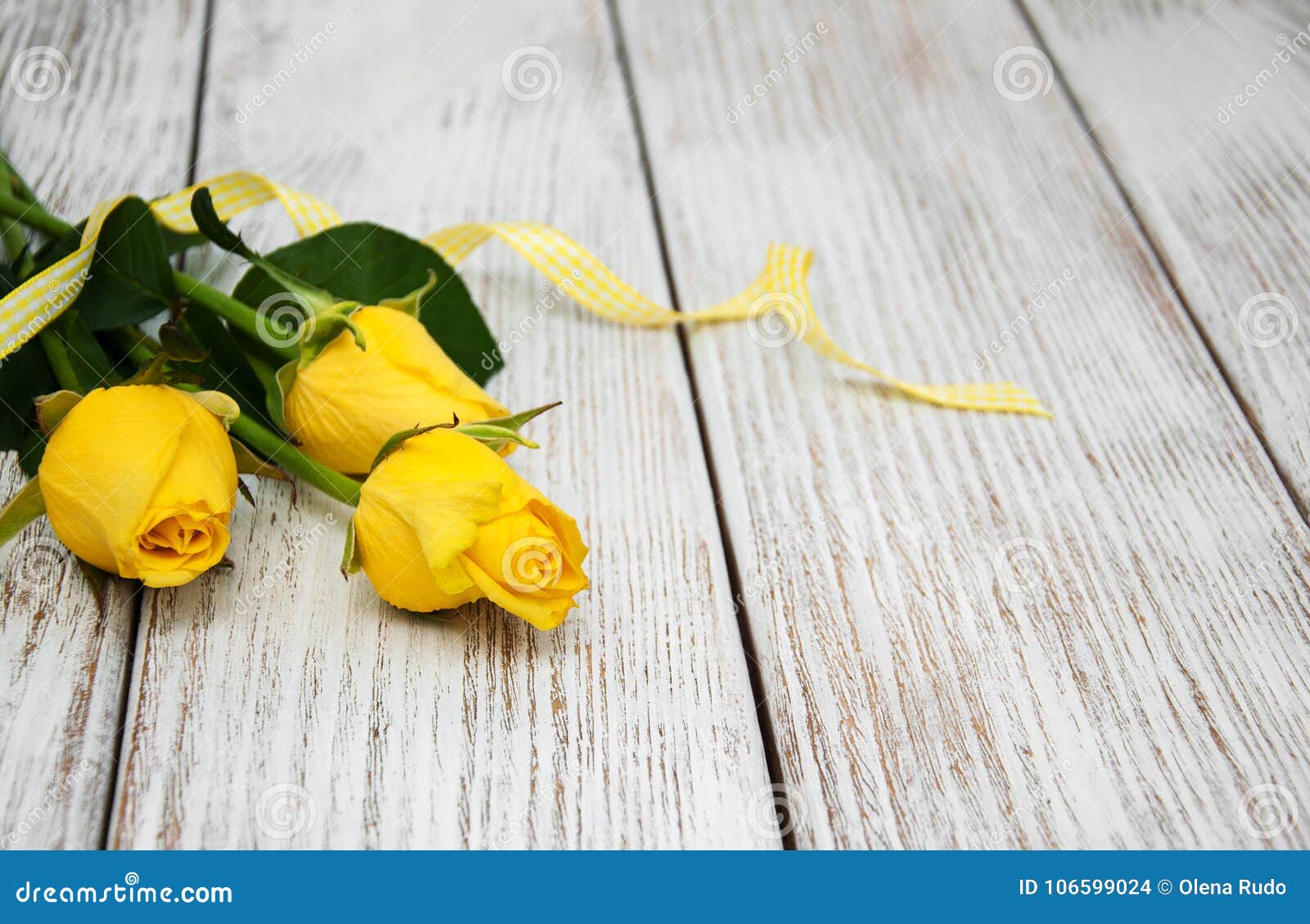 Yellow roses on a table stock photo. Image of decoration - 106599024