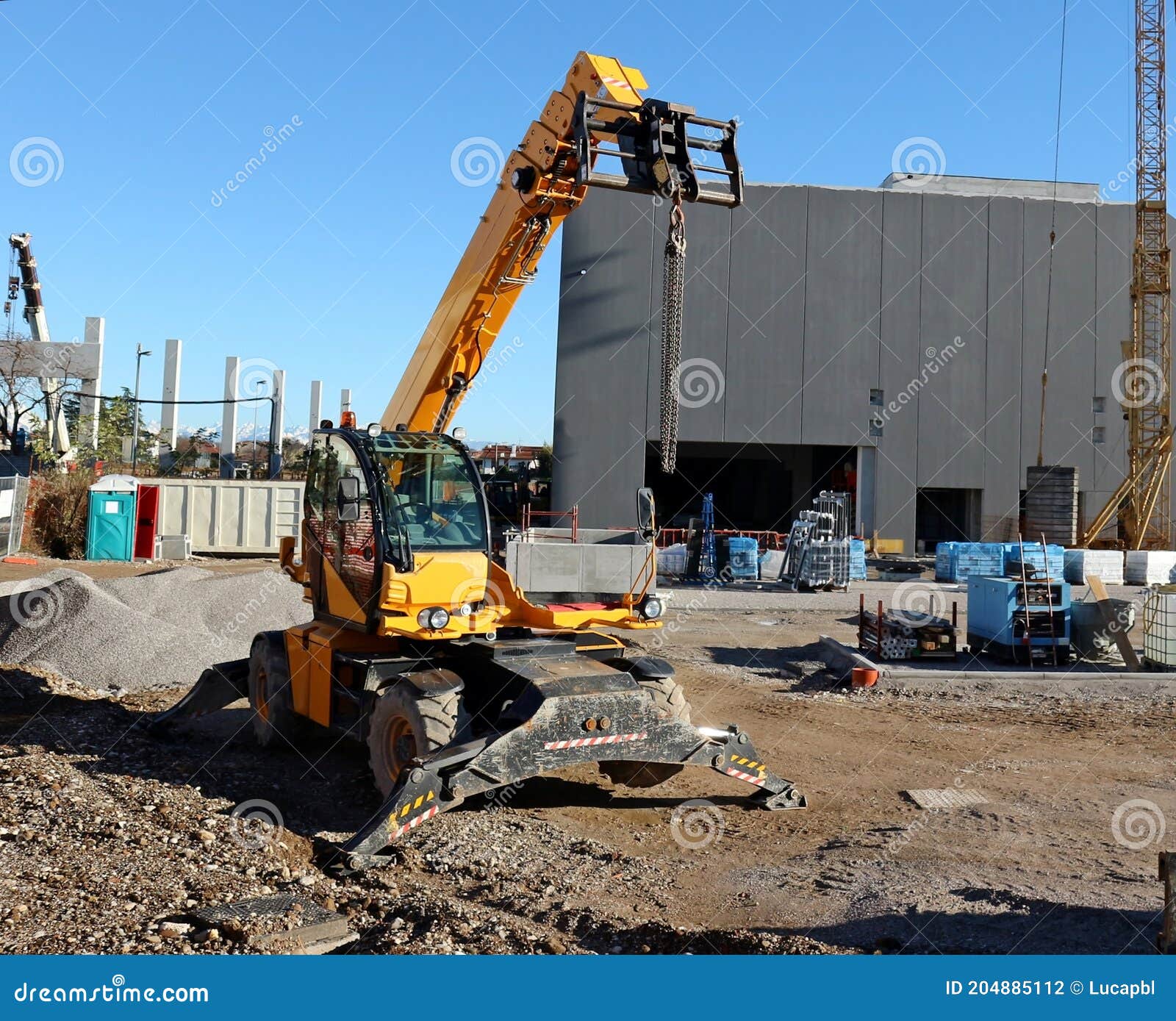 Yellow Rotating Telehandler Work On Steel Beams In The Construction ...