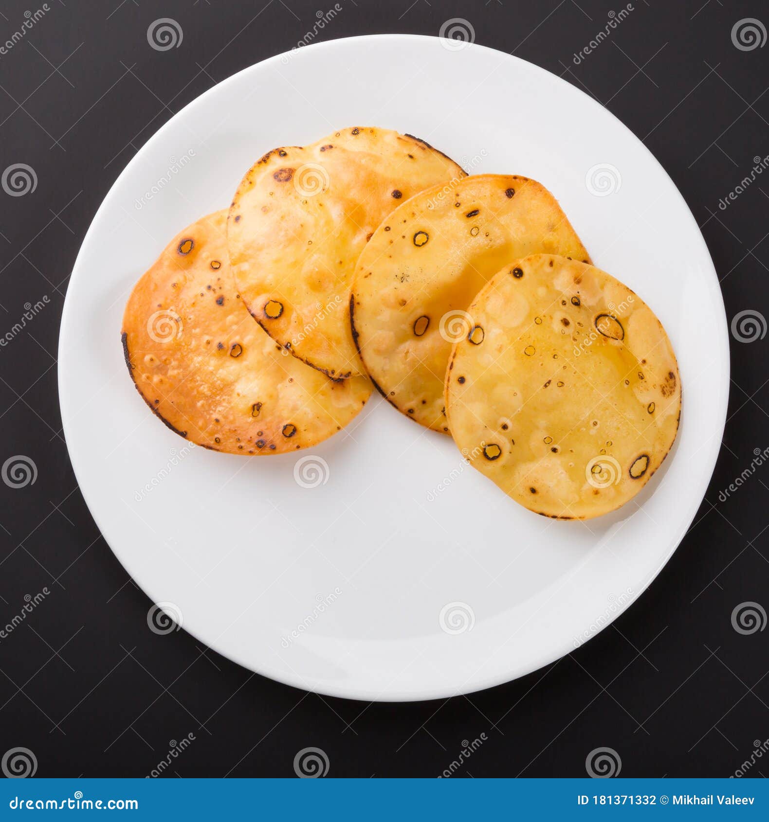 Yellow round potato chips stock photo. Image of crisp - 181371332