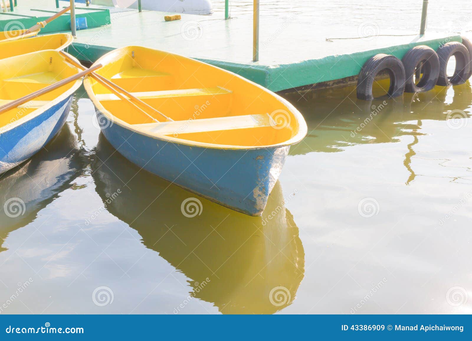Yellow rowboat stock image. Image of water, yellow, outdoors - 43386909