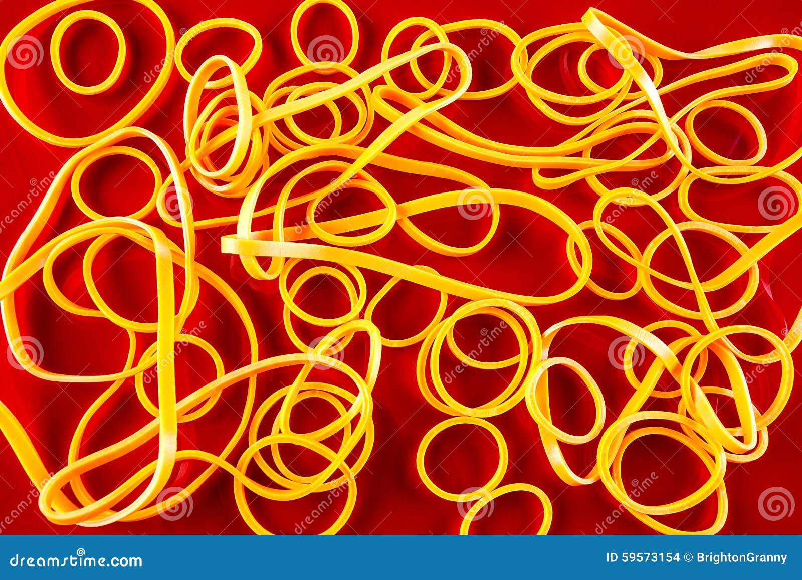 Yellow rubber bands stock photo. Image of short, supplies - 59573154