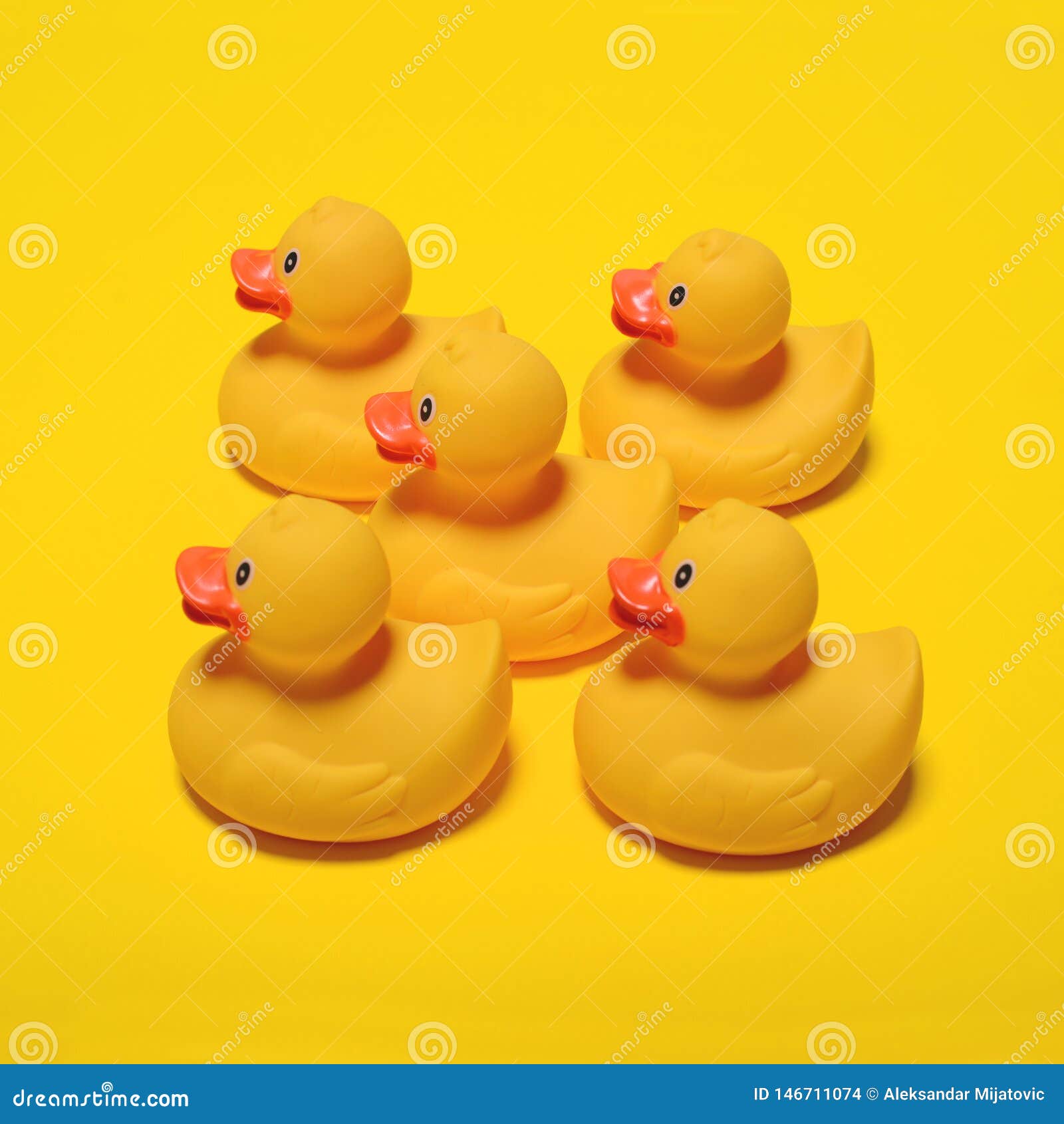 Yellow Rubber Ducks on Yellow Background - Minimal Design Stock Photo ...