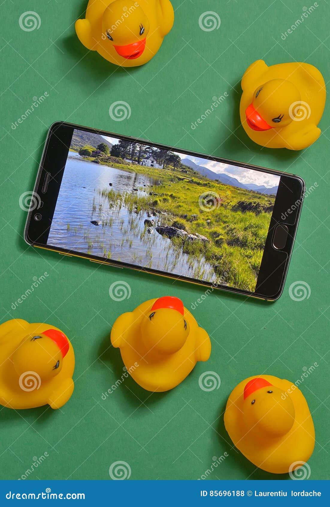 Yellow Rubber Ducks and Smartphone Concept Stock Photo - Image of ...