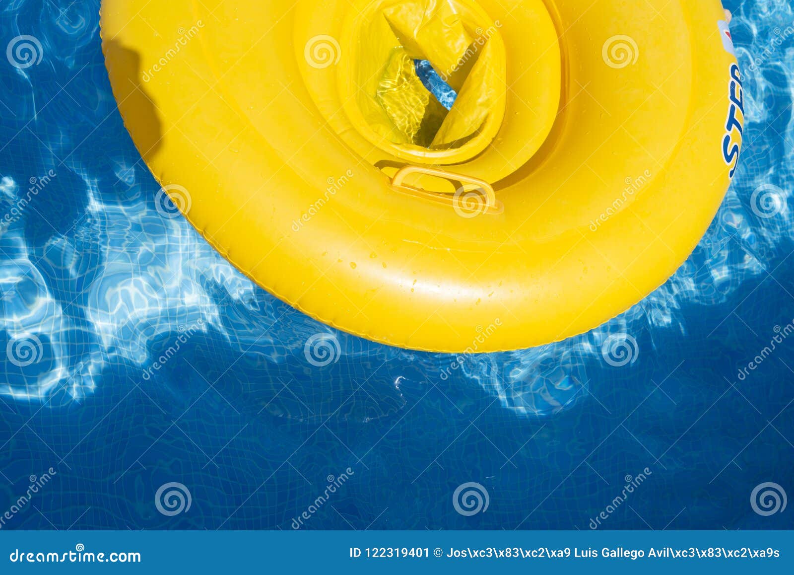 Yellow Rubber Ring Floating in a Pool. Stock Image - Image of sunny ...