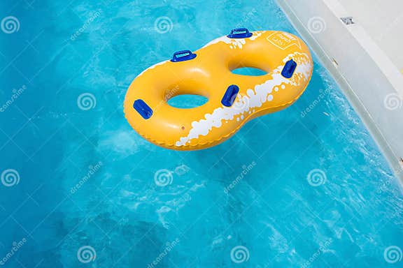 Yellow Rubber Ring Floating Stock Image - Image of childhood, preserver ...