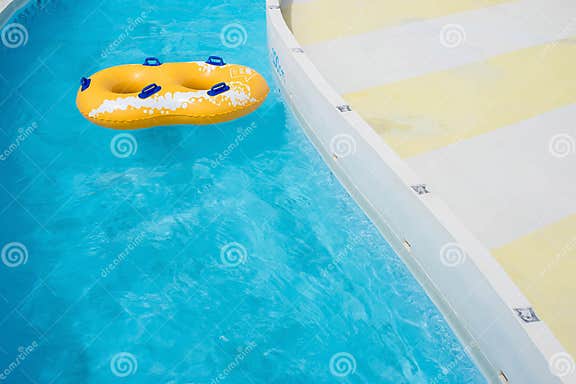 Yellow Rubber Ring Floating Stock Photo - Image of rubber, swimming ...