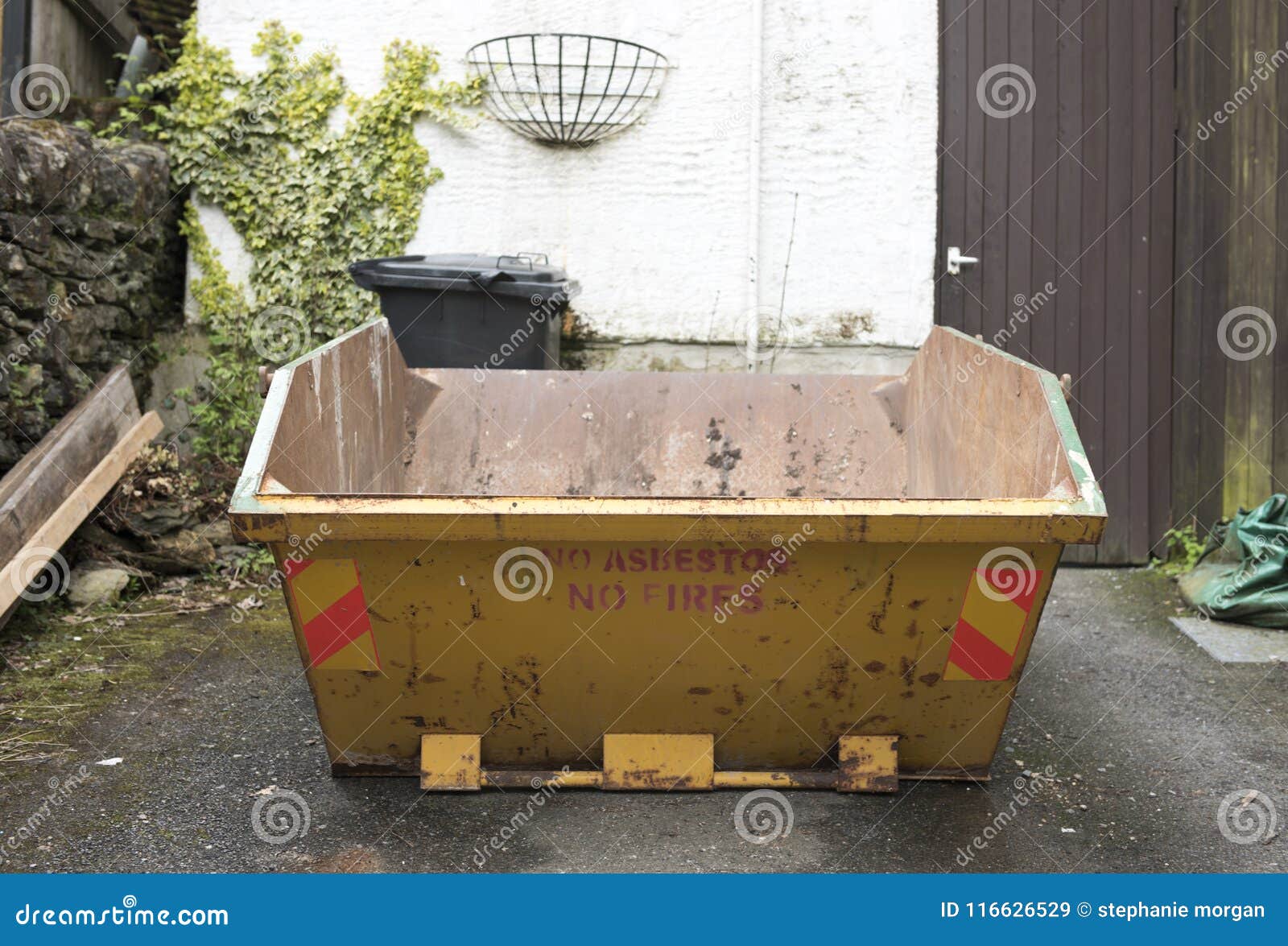 Yellow Rubbish Skip Outdoors Stock Image - Image of hire, industry ...