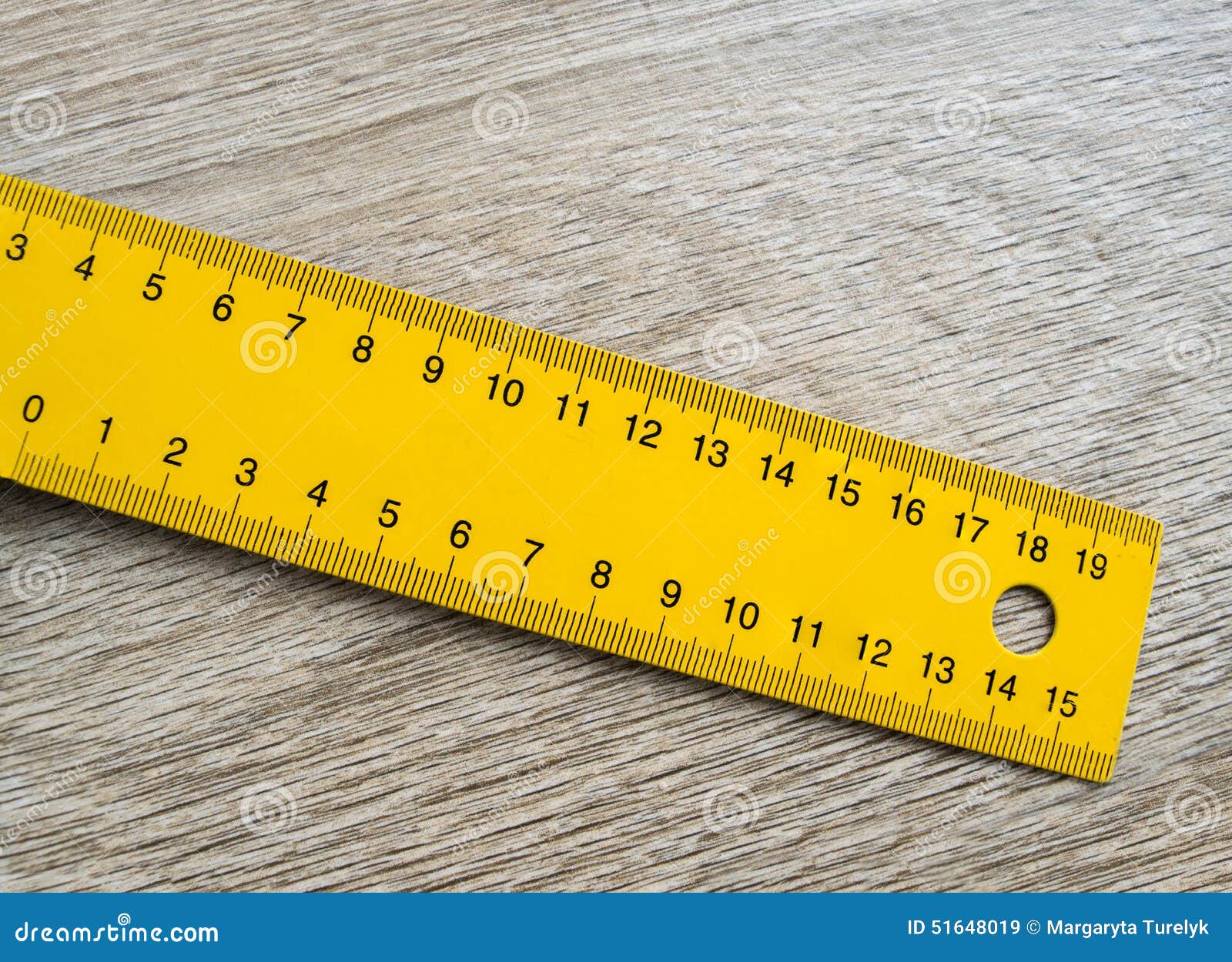 Yellow ruler on the table stock image. Image of objects - 51648019