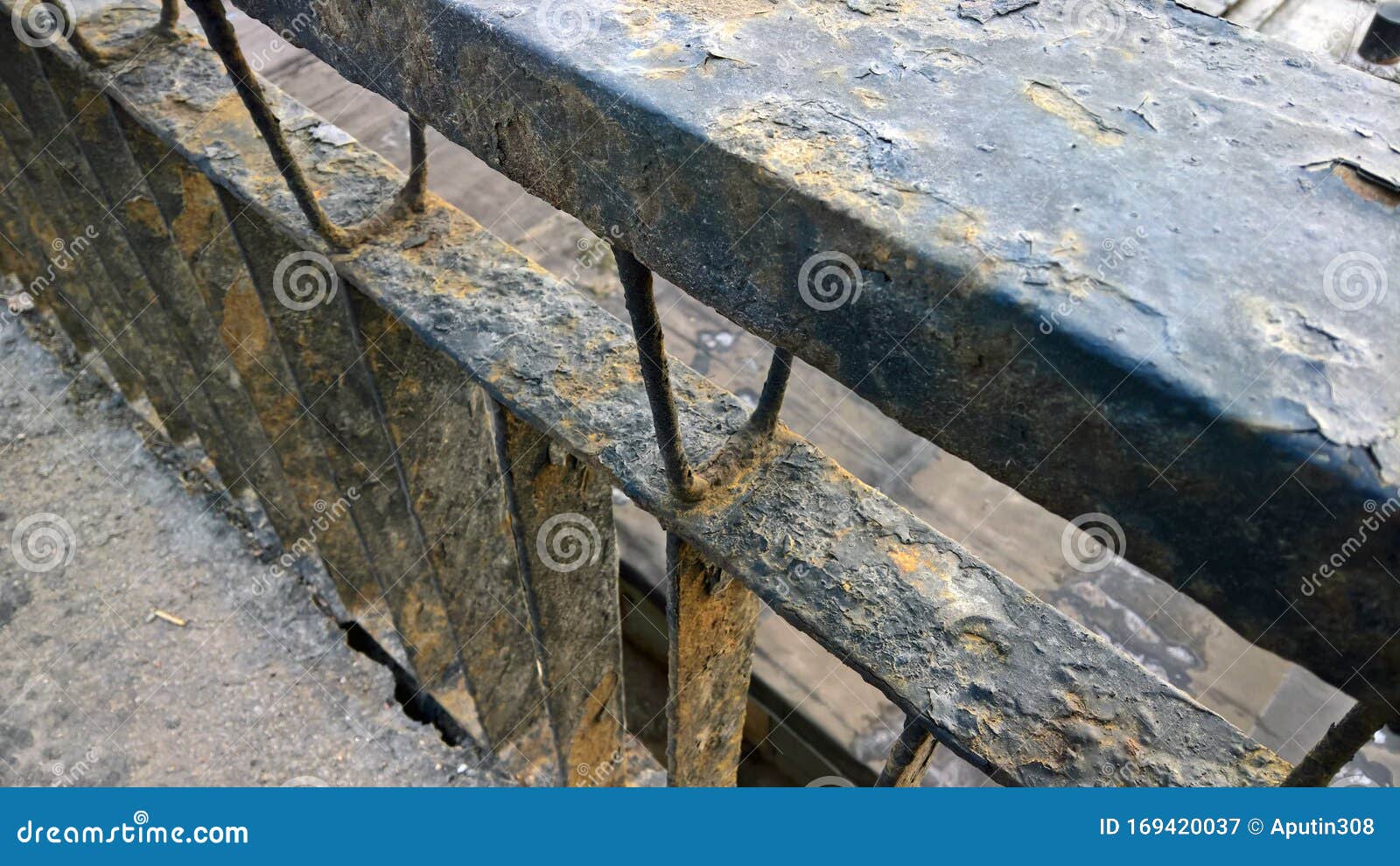 Yellow Rust on Metal Railing. Black Paint Stock Image - Image of ...