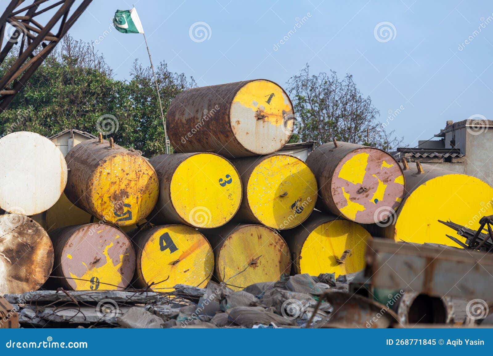 Yellow rusted barrels stock image. Image of maintenance - 268771845