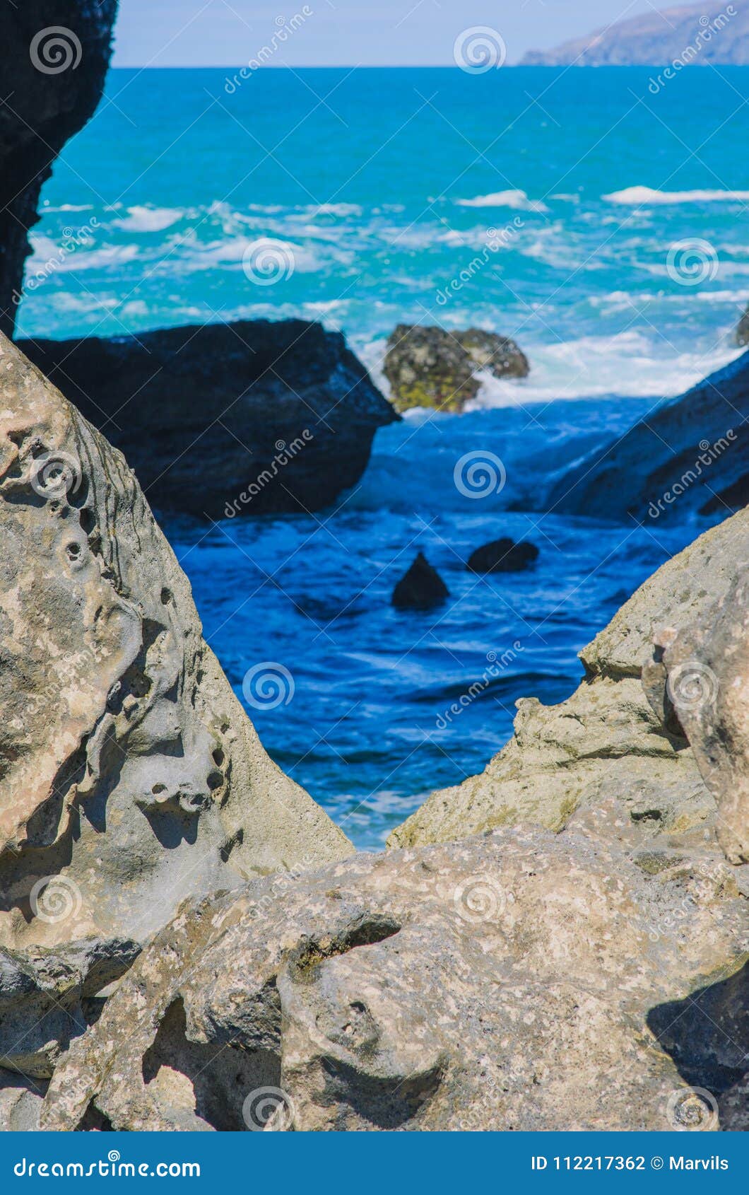 Sandstone and ocean stock photo. Image of island, seascape - 112217362