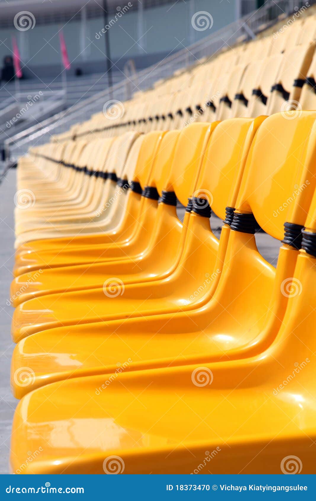 Yellow seat in stadium stock photo. Image of audience - 18373470
