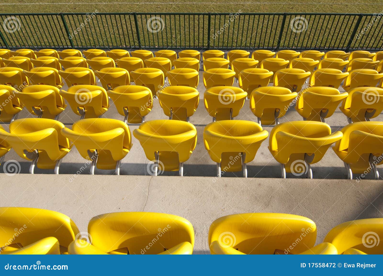 Yellow seats at stadium stock photo. Image of vacant - 17558472