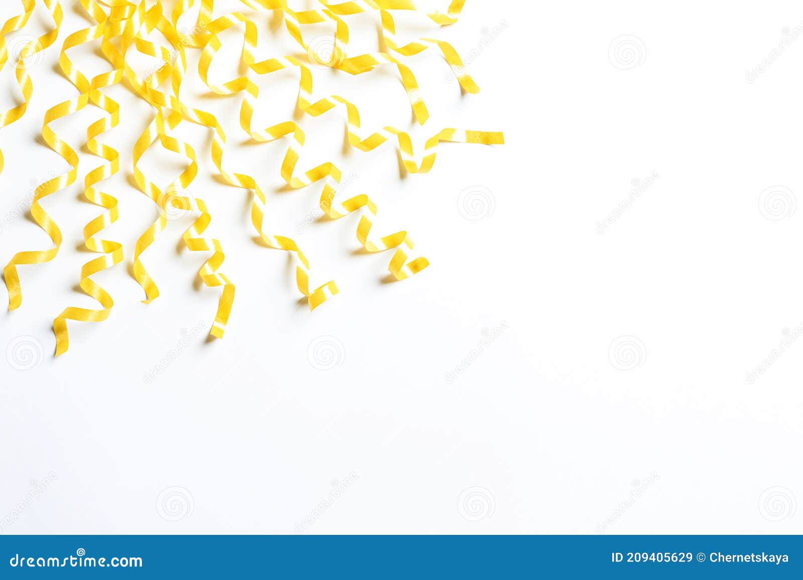 Yellow Serpentine Streamers on White Background, Top View Stock Image ...