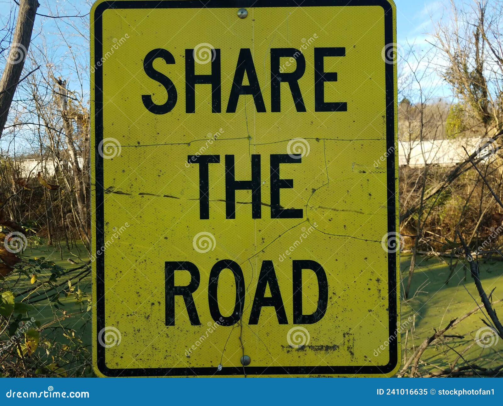Yellow Share the Road Sign with Black Text Stock Image - Image of ...