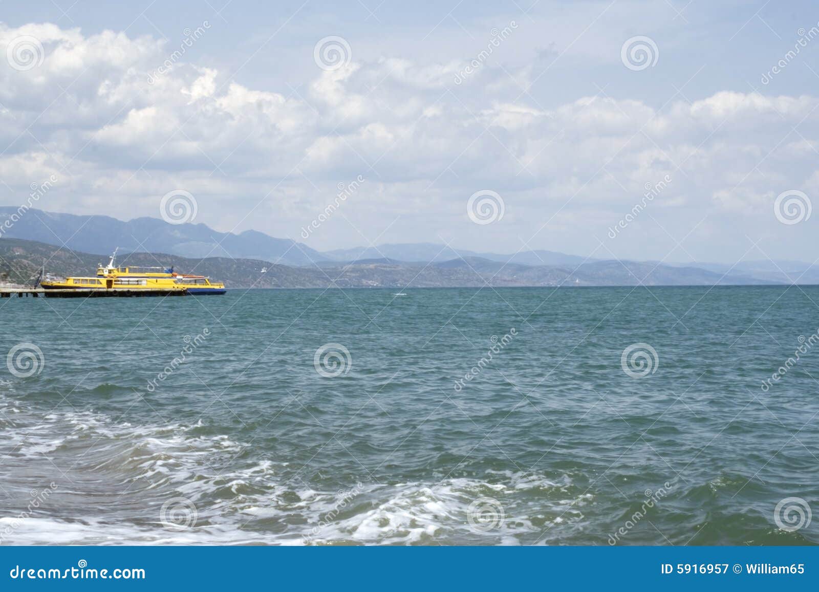 Yellow ship on ocean stock image. Image of vacation, sunny - 5916957