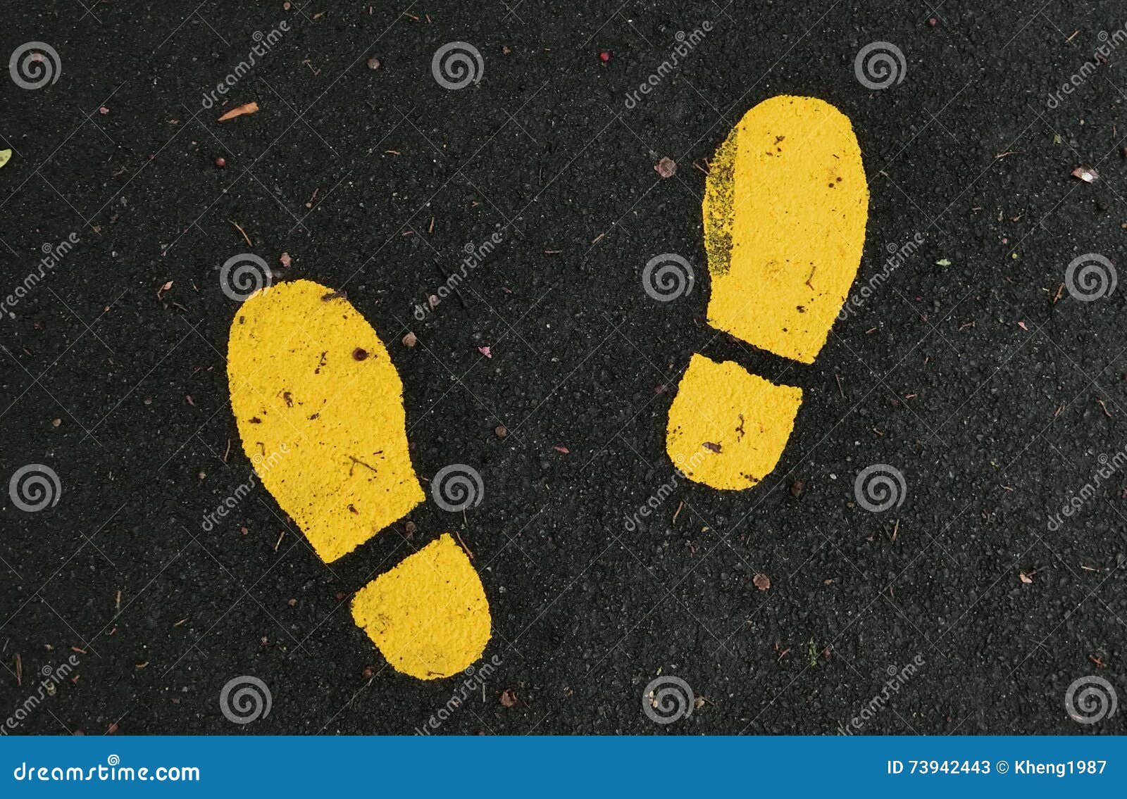 Yellow Shoe Prints stock image. Image of road, ground - 73942443