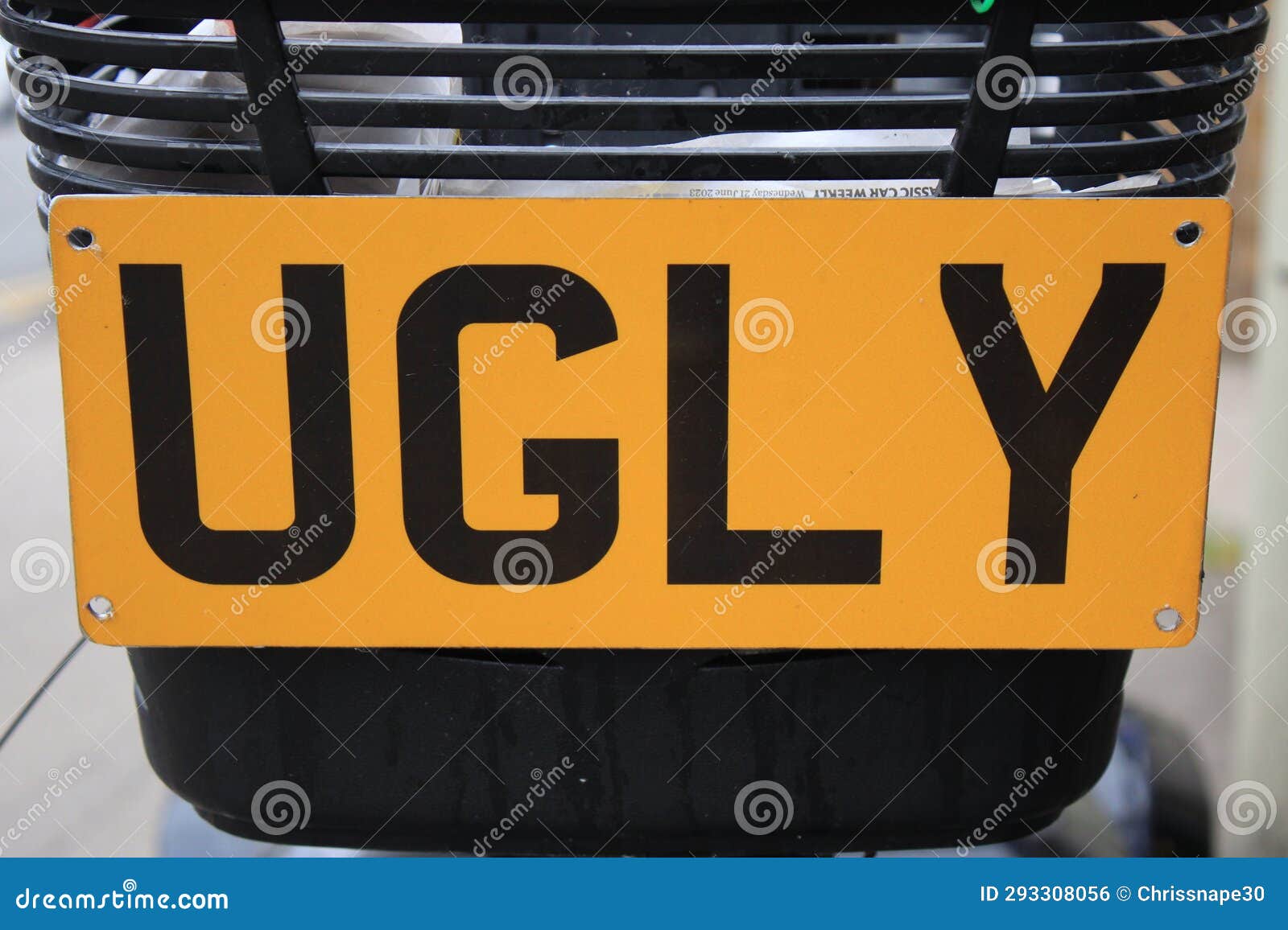 Yellow Sign with Black Text UGLY Stock Photo - Image of hostile ...