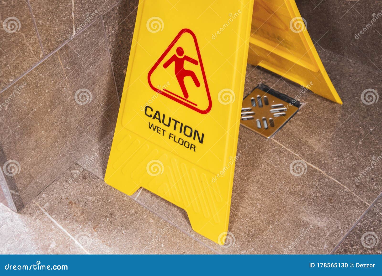 Yellow Sign Caution Wet Floor with a Falling Man Stock Photo - Image of ...