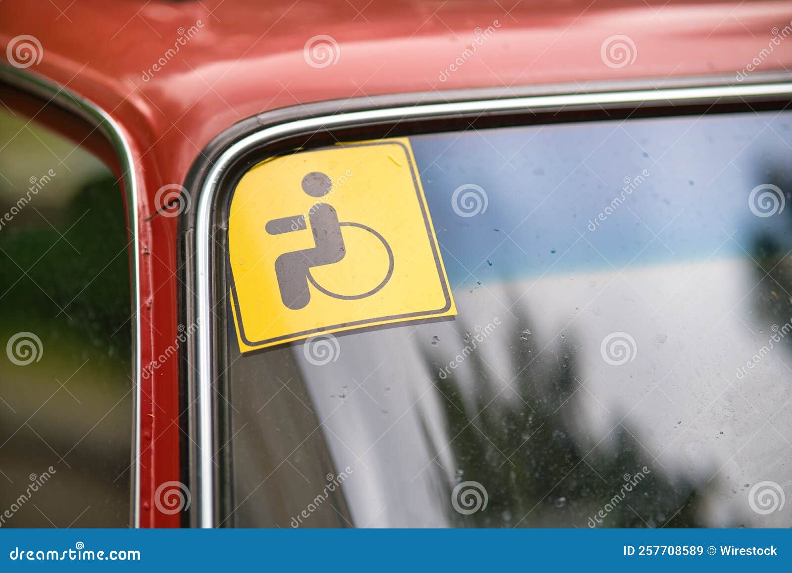 Yellow Sign Indicating a Disabled Driver at the Car Stock Image - Image ...