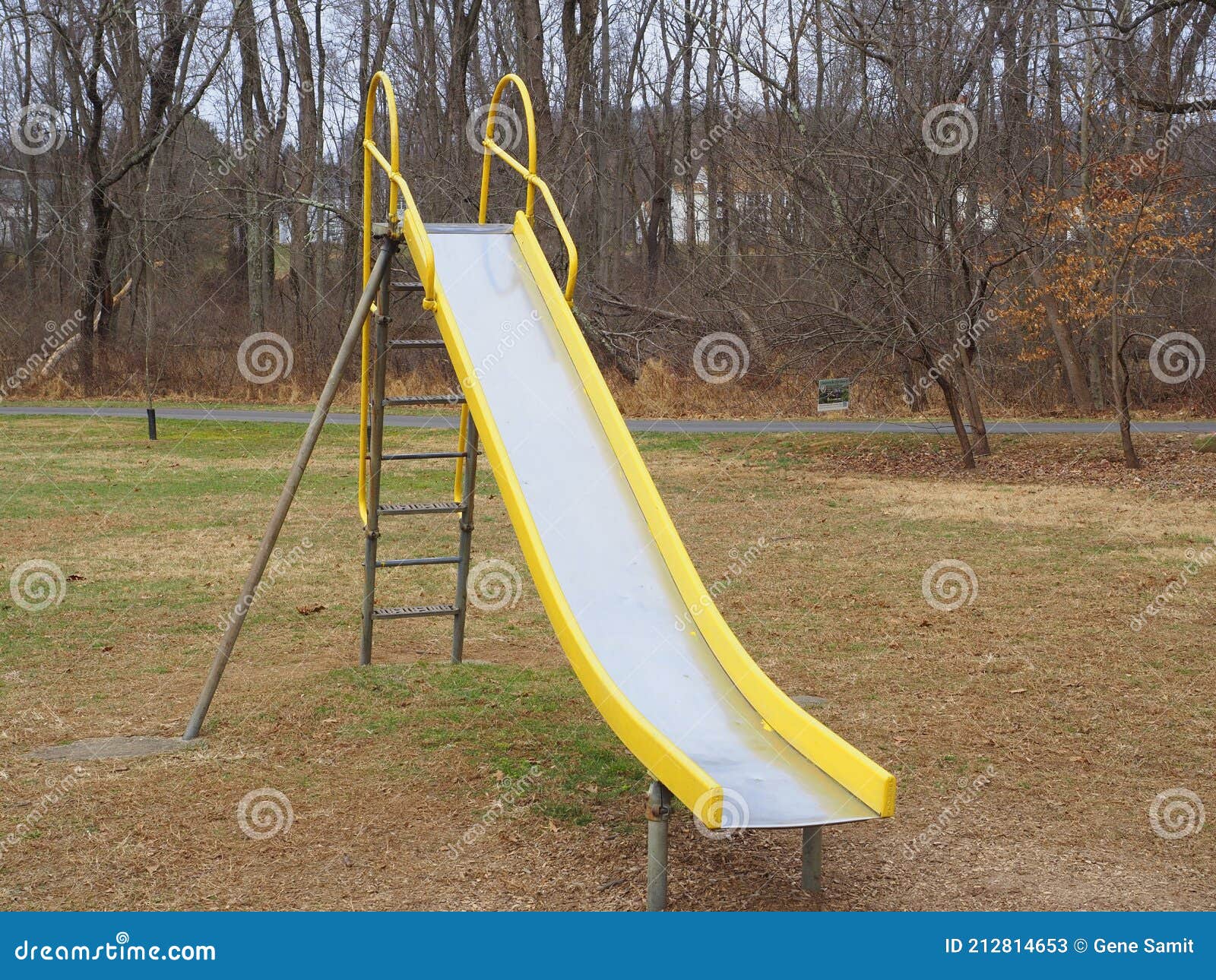 The Yellow Slide is Popular at the Playground. Stock Image - Image of ...