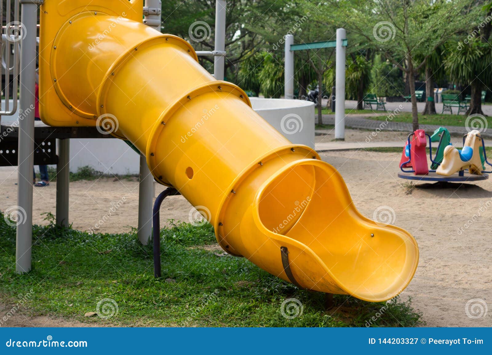 Yellow Slider Tunnel in Park Stock Image - Image of slide, park: 144203327