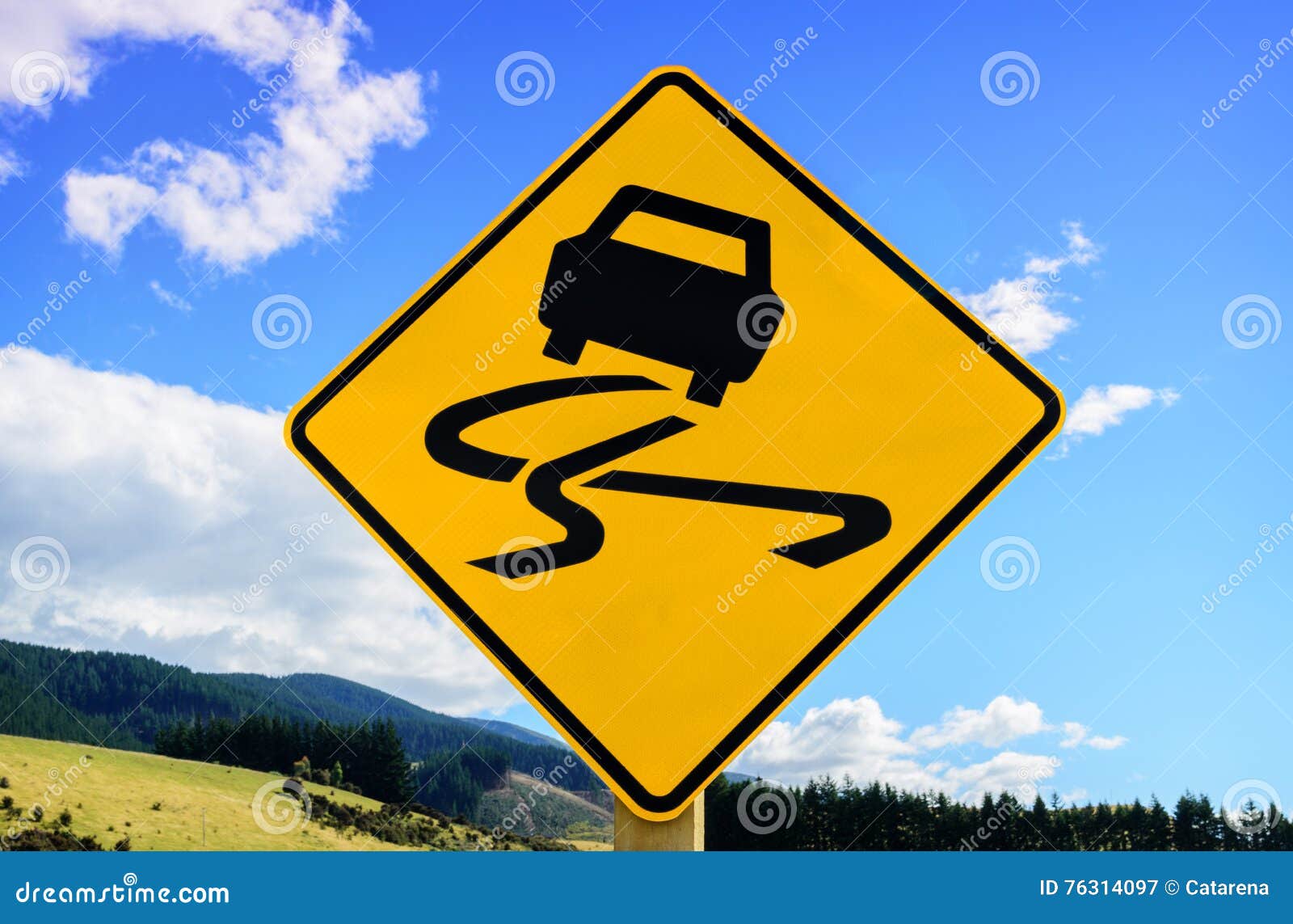 Yellow slippery road sign stock image. Image of design - 76314097