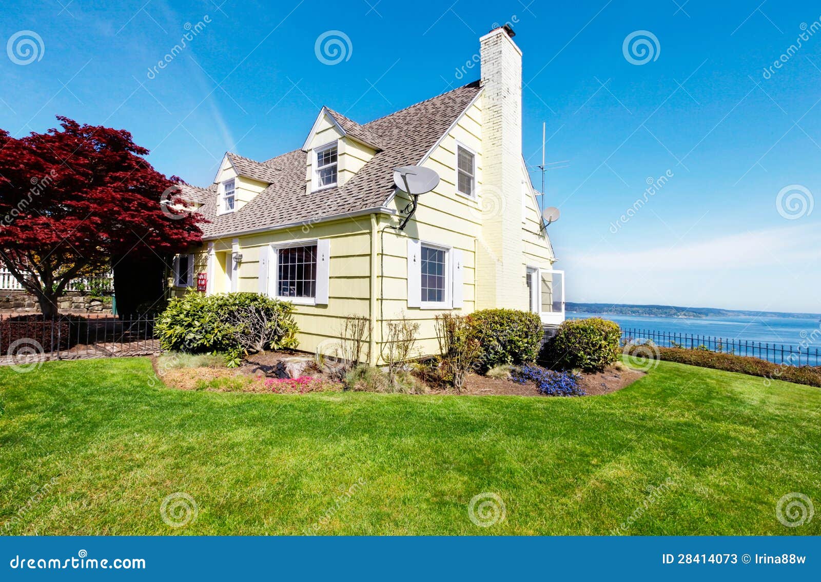 Yellow Small Home with Water View and Red Maple. Stock Image - Image of ...
