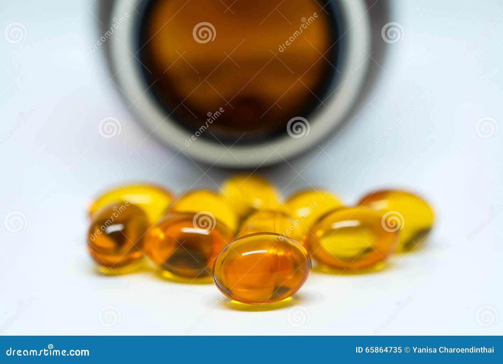 Yellow Soft Gels Spill from the Bottle Stock Image - Image of gels ...