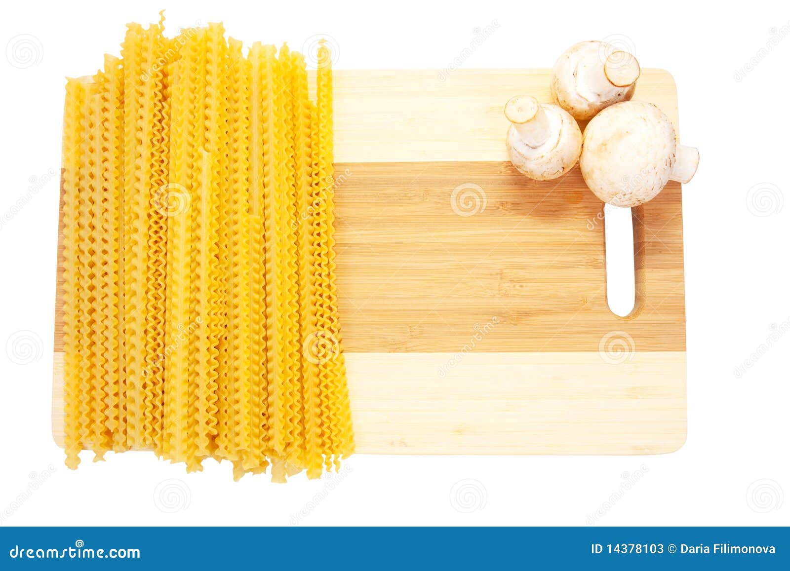 Yellow Spaghetti on Cutting Board Stock Image - Image of basics, penne ...