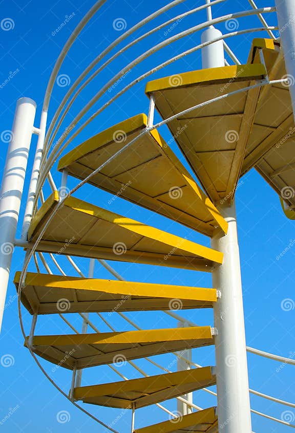 Yellow spiral ladder stock photo. Image of freedom, business - 25083232