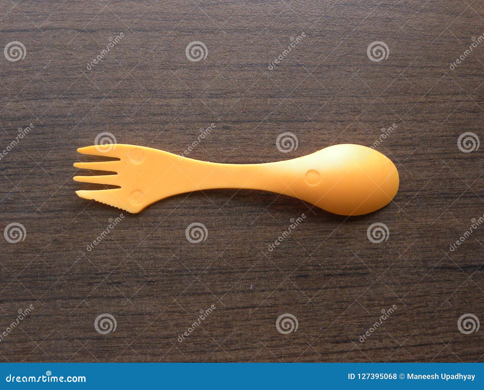 Yellow spork spoon stock photo. Image of cutout, cutlery - 127395068