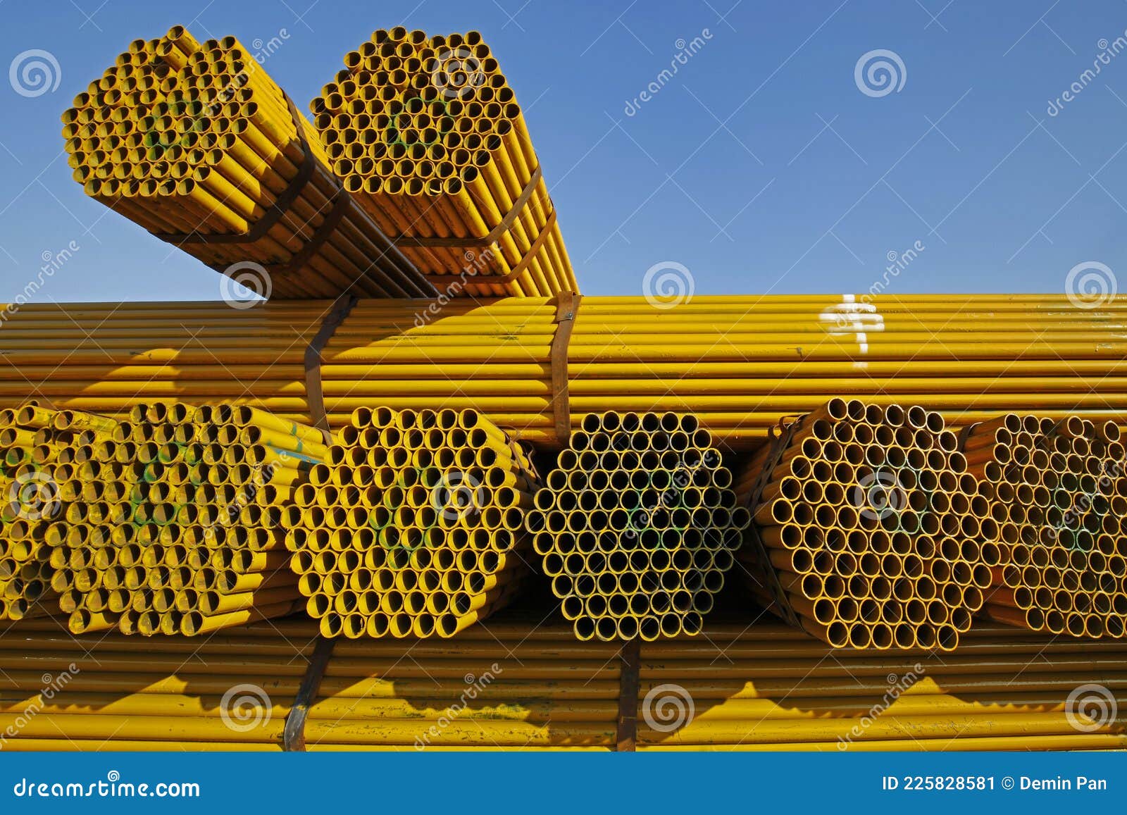 Yellow stacked steel pipe stock image. Image of plastic - 225828581